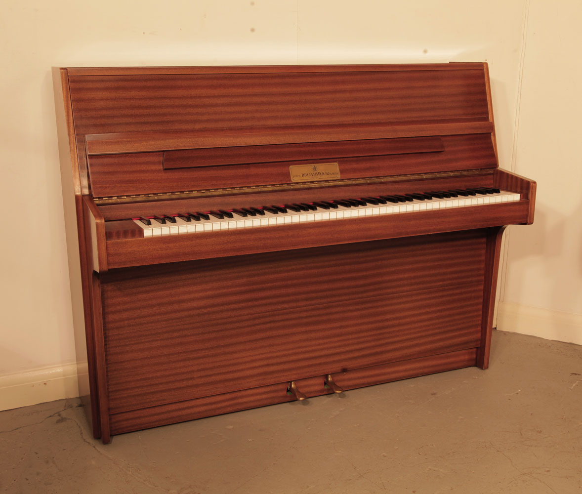 Pre-owned, 1982, Broadwood upright piano with a polished, mahogany case ...